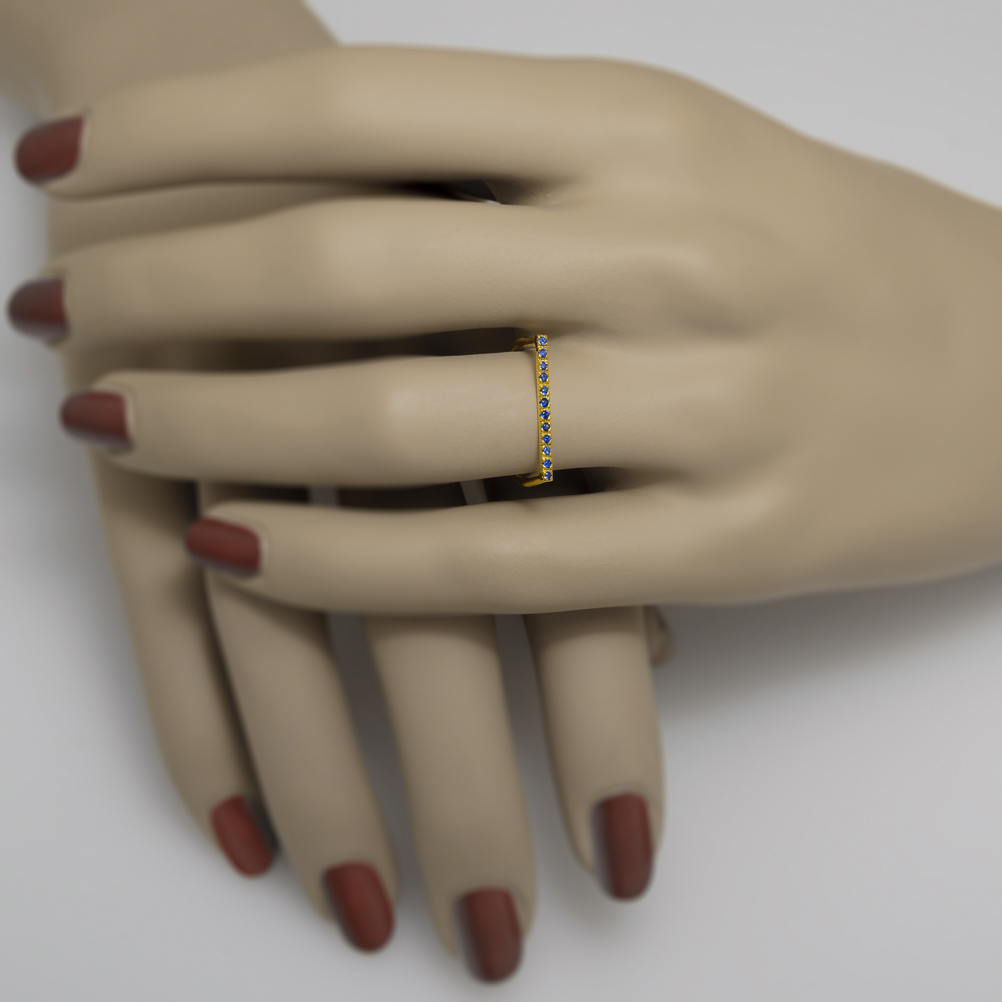 Ring in lustrous gold and dark blue sapphires | KORI Shop