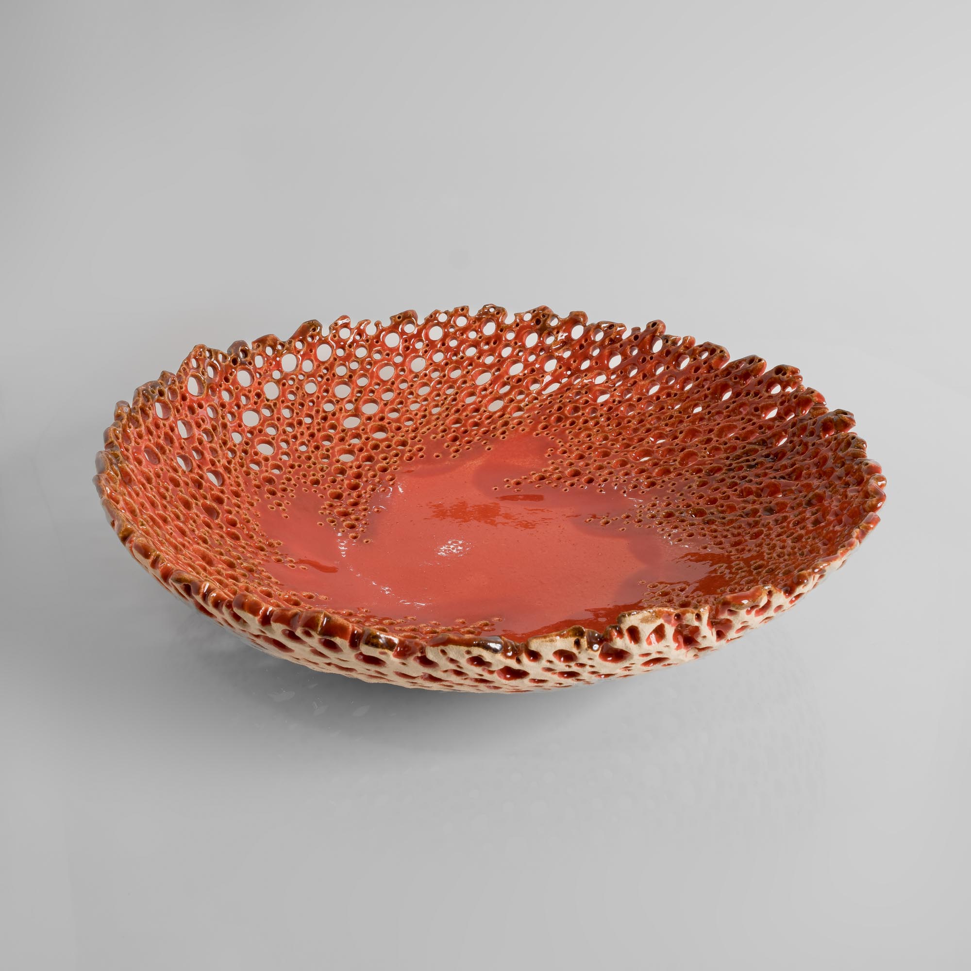 Red perforated ceramic platter | KORI Shop